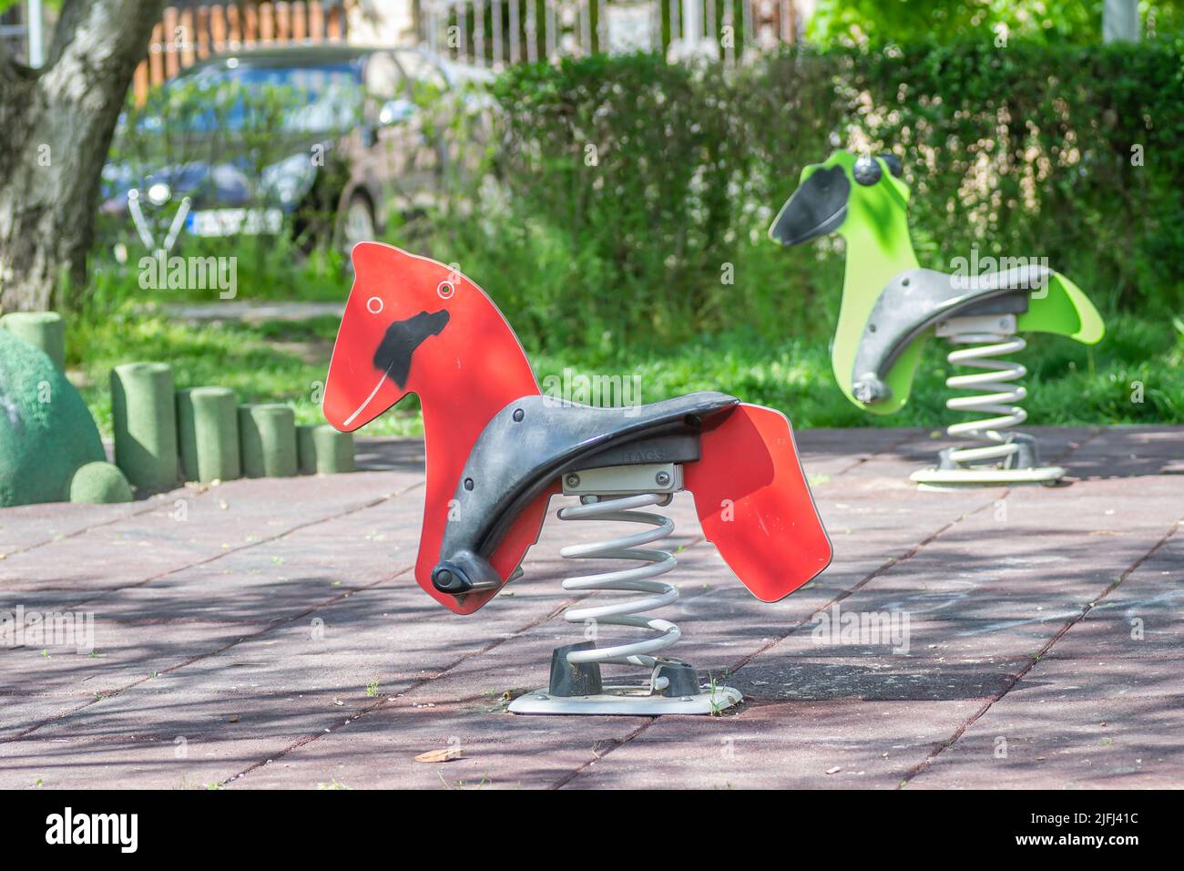 A view of rockers on a spring in children playground Stock Photo - Alamy