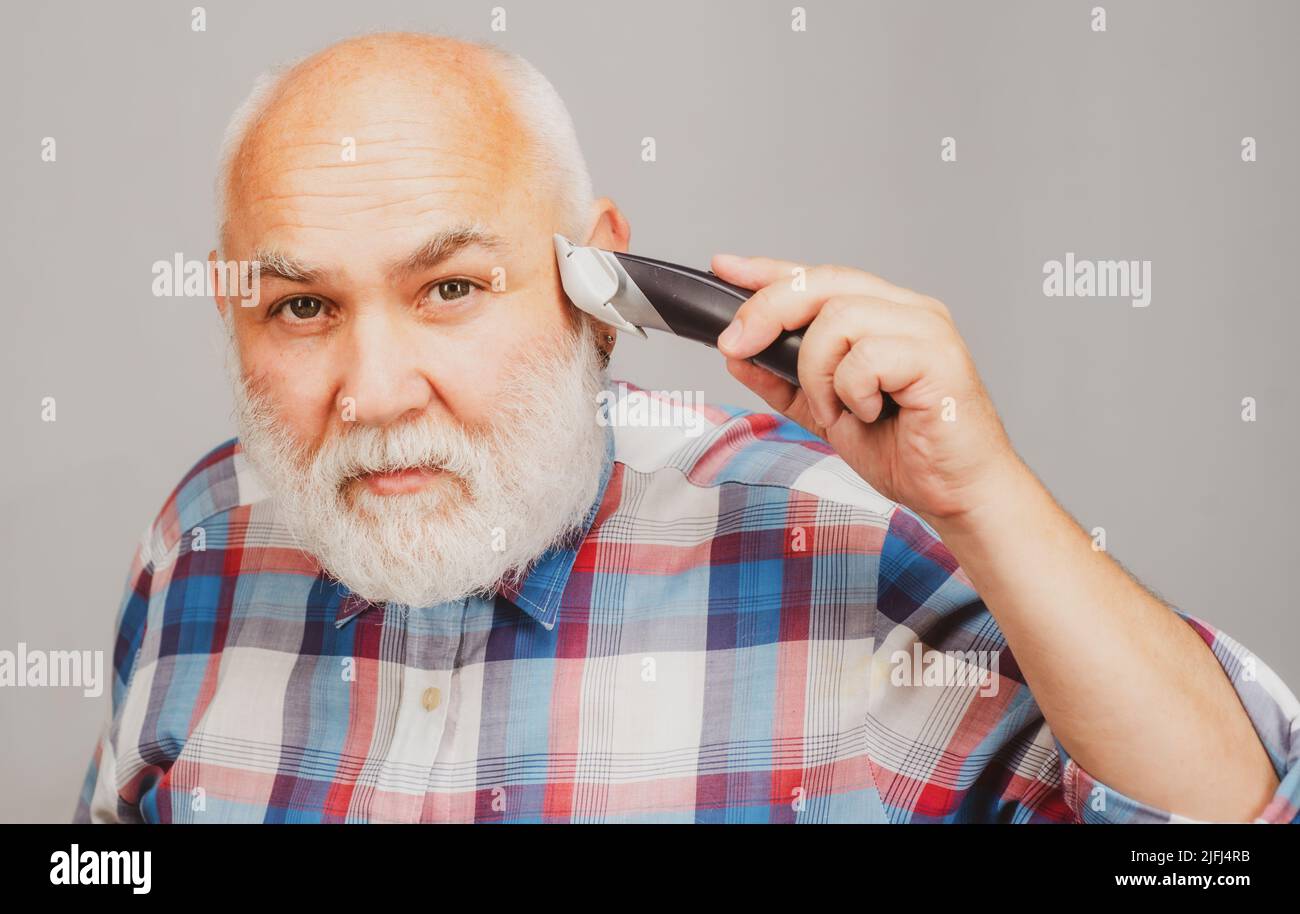 Mature man with hair clipper. Old bald man hair clipper, Mature ...