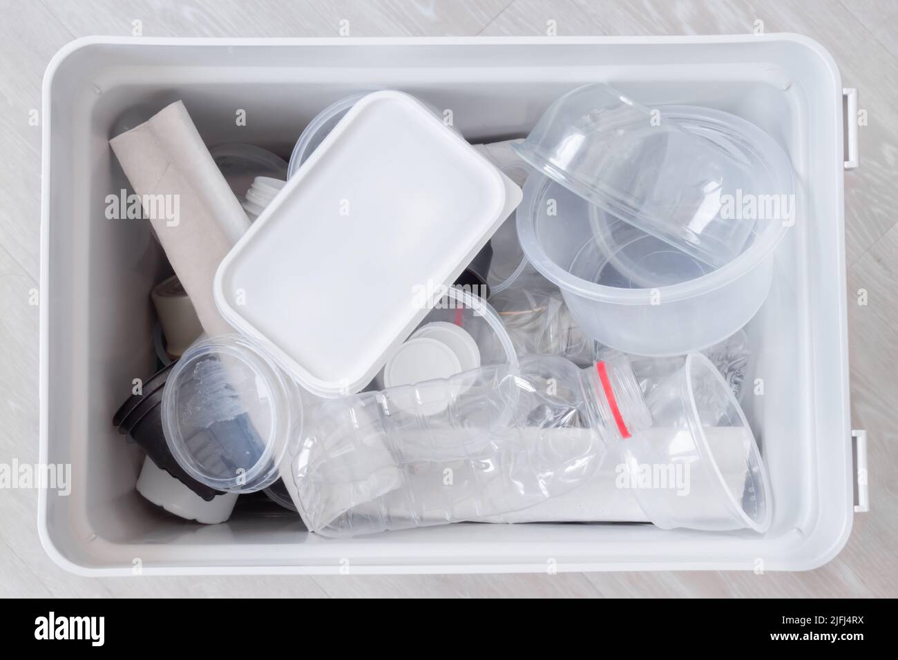 Sorting of garbage in recycling bin - top view Stock Photo - Alamy