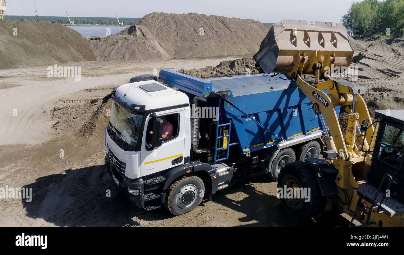 Aerial view of mining machinery. Scene. The bulldozer works at the ...