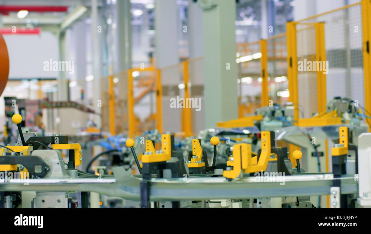 Robotic mechanism, industrial robot iin motion at the modern factory ...