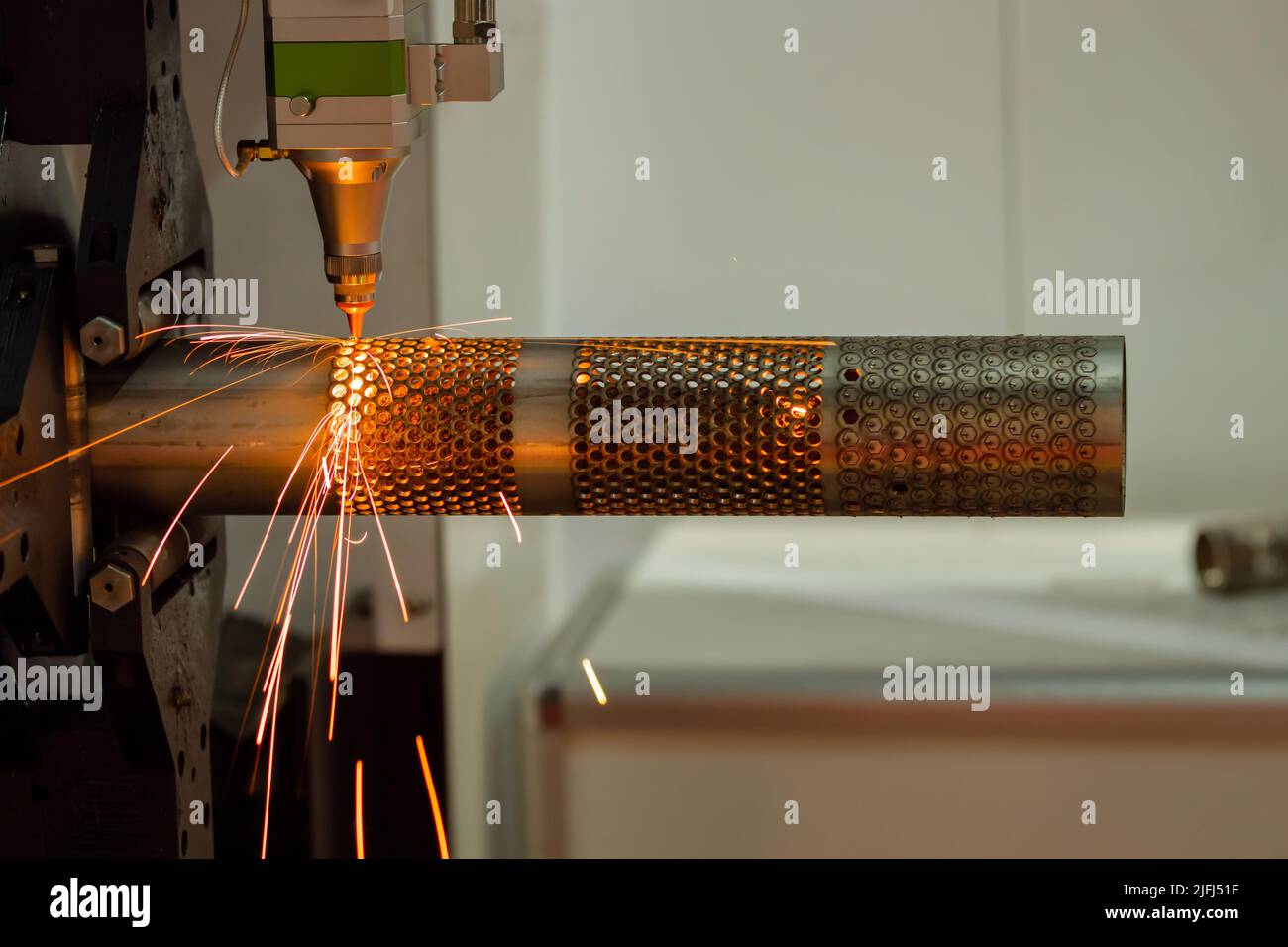 Laser cutting machine working with metal workpiece with sparks Stock ...