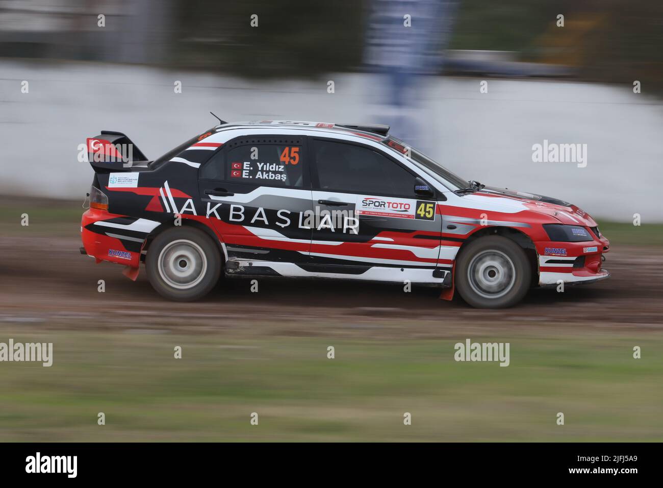 KOCAELI, TURKEY - DECEMBER 26, 2021: Erhan Akbas drives Mitsubishi ...