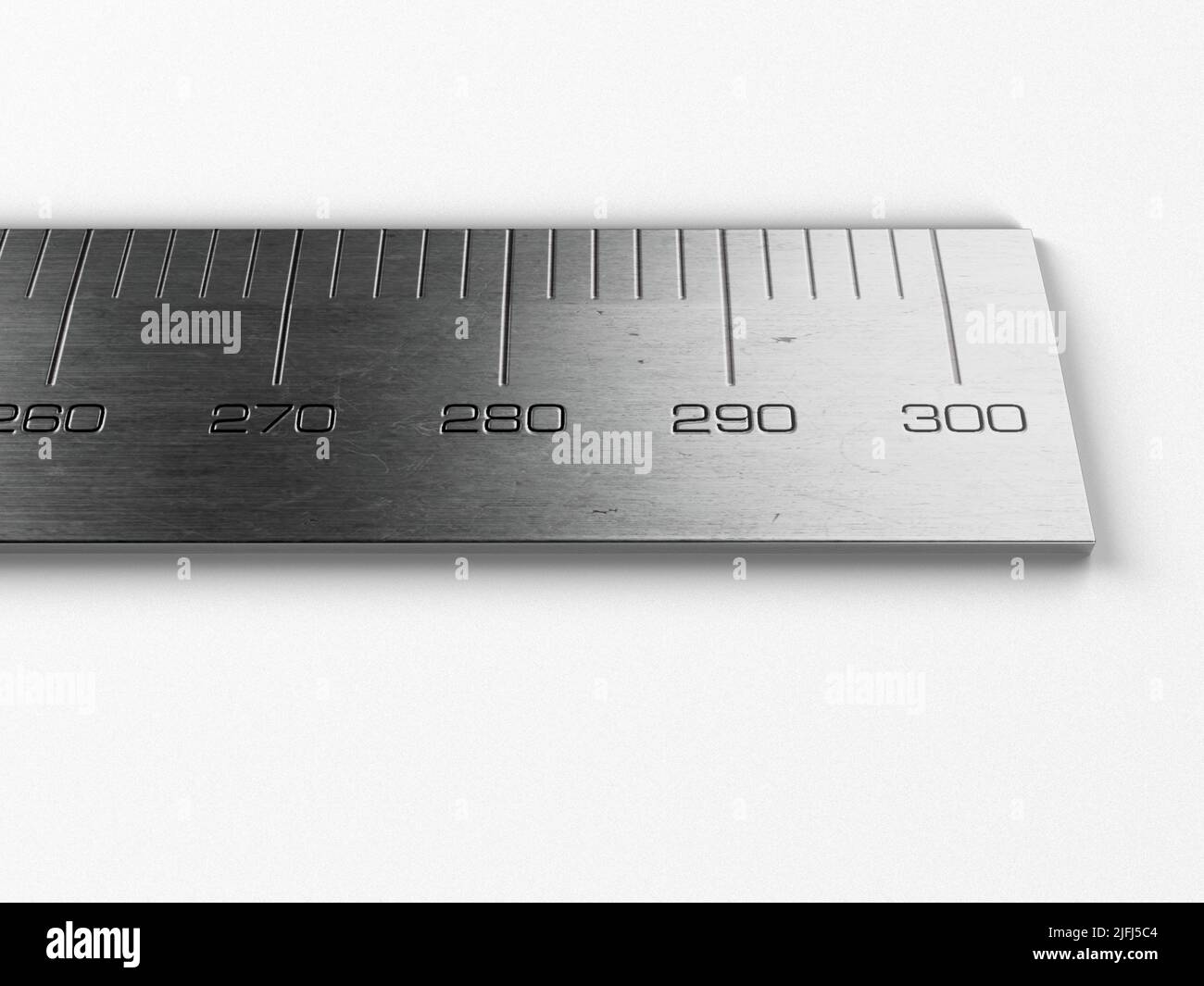 A close up view of a section of a steel ruler with indented ...