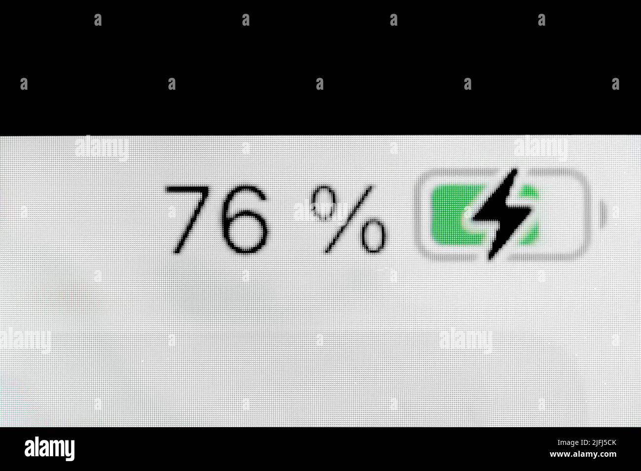 Smartphone charged battery level indicator - 76 percent: close up macro ...