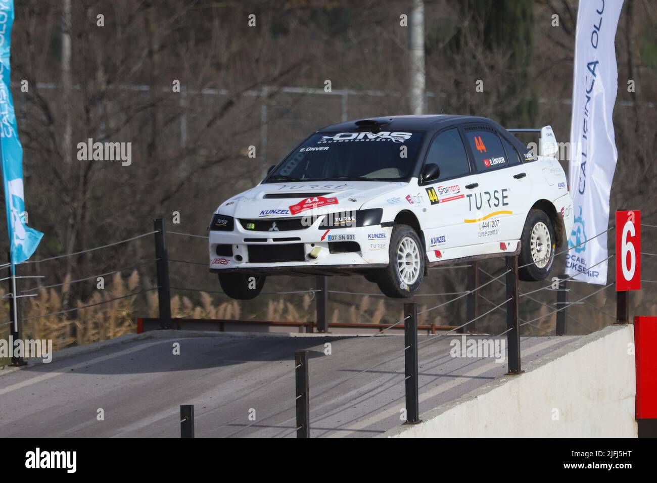 KOCAELI, TURKEY - DECEMBER 26, 2021: Efe Unver drives Mitsubishi Lancer ...