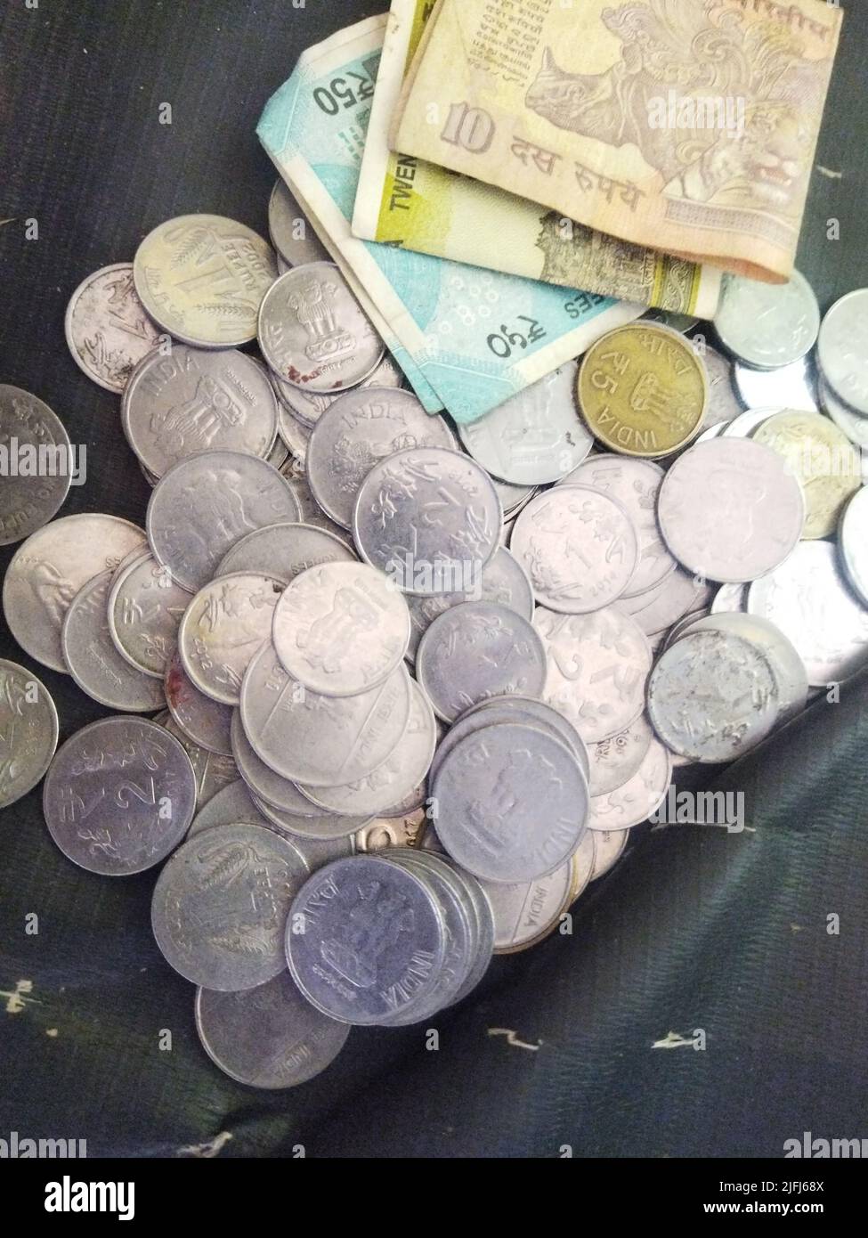 Indian money rupees background. Coins and notes on carpet Stock Photo ...