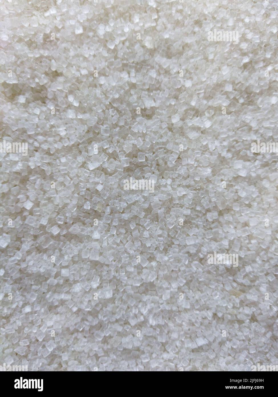 Texture background of spilling sugar. White sugar crystals background ...