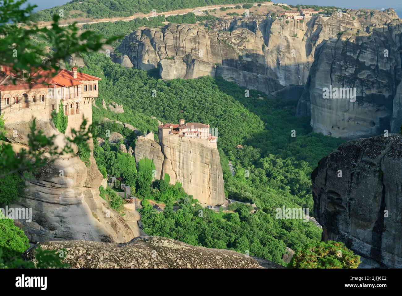 Stone monastery in the mountains. Kalabaka, Greece summer cloudy day in ...