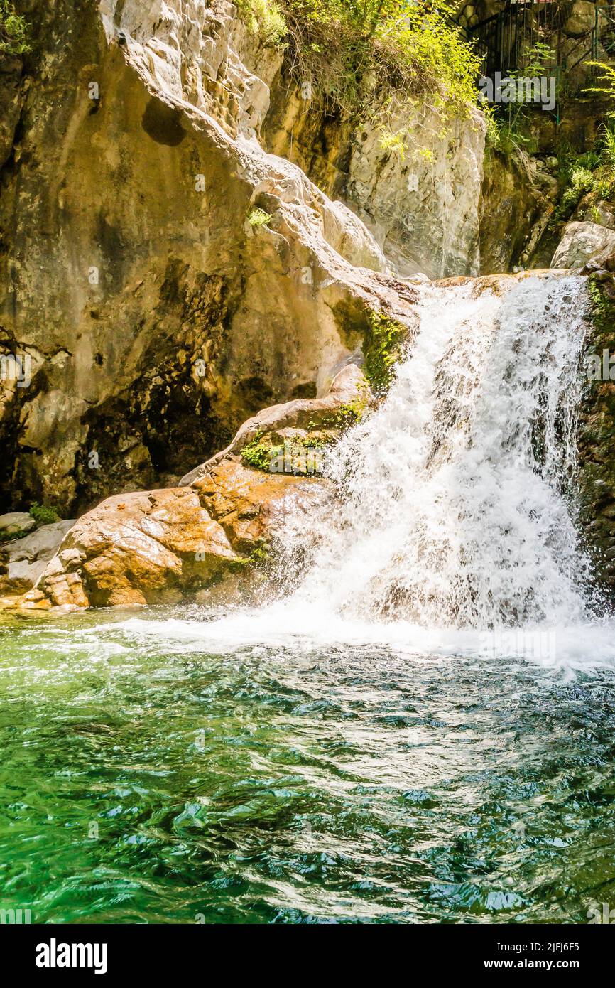 A vertical view of "Zeus Bath" river on mount Olympus Stock Photo - Alamy