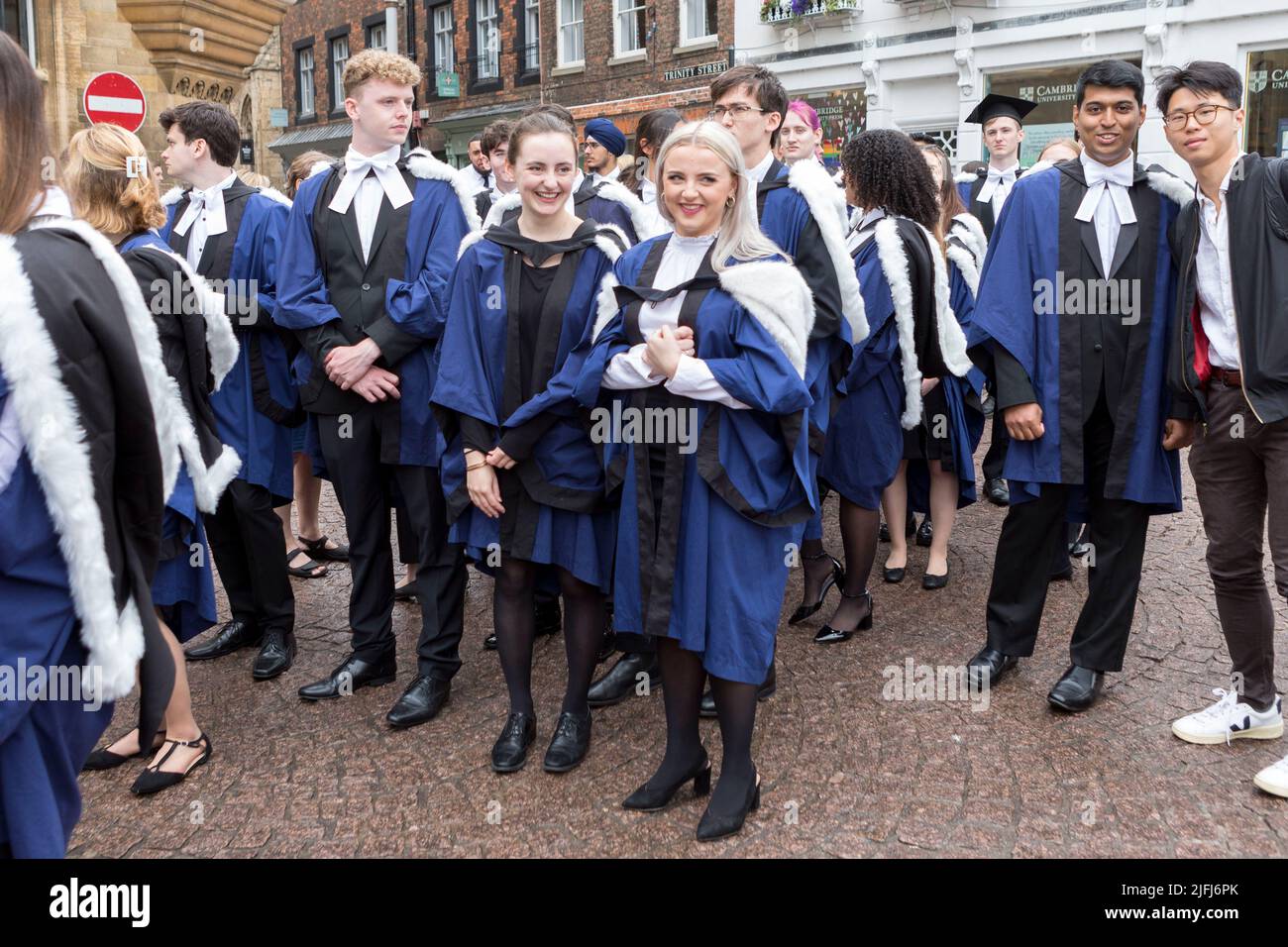 Cambridge graduates attend their graduation ceremony this morning at ...