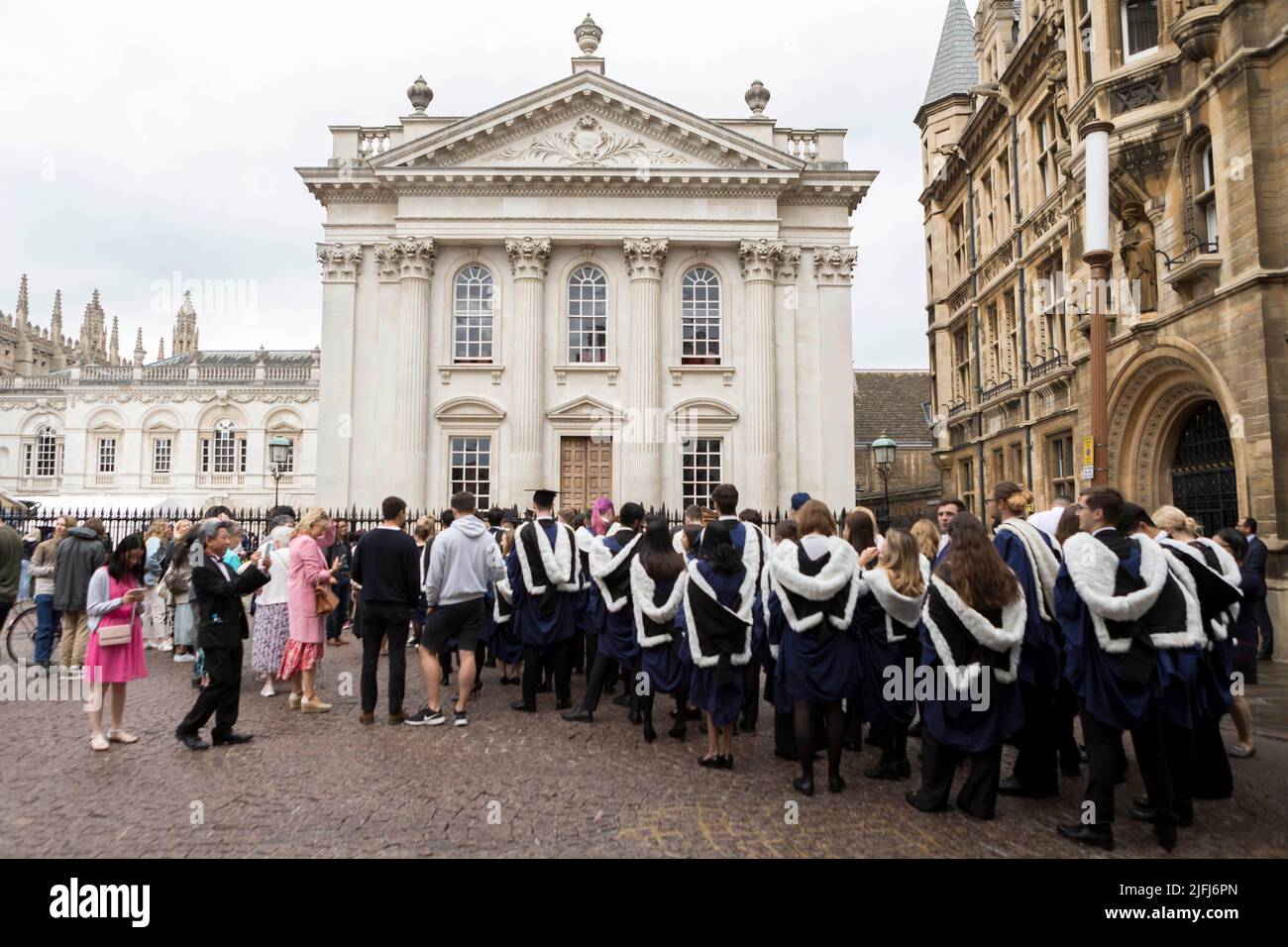 Cambridge graduates attend their graduation ceremony this morning at ...