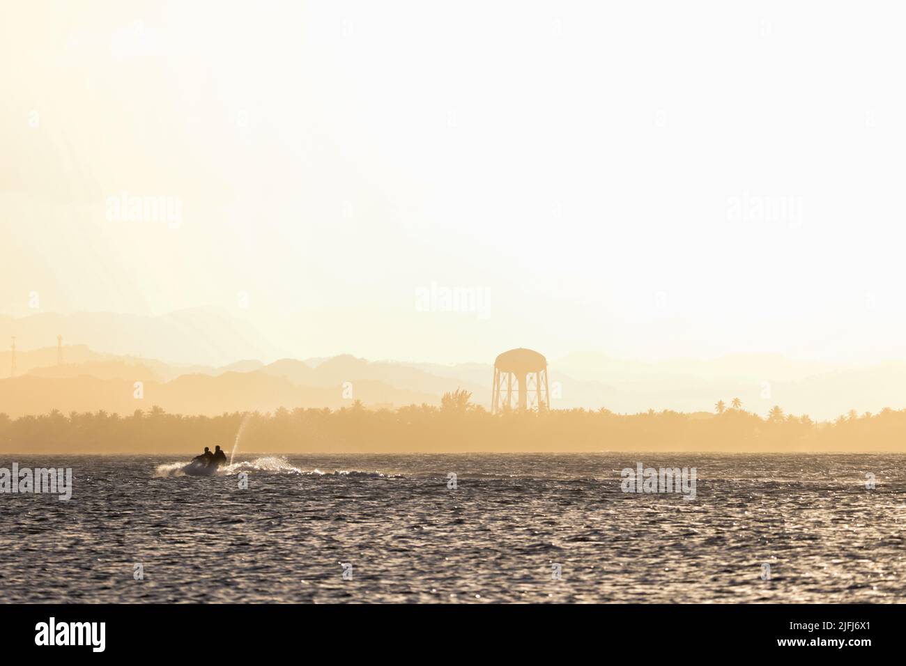 Couple on Jet Ski during sunset in San Juan Puerto Rico Stock Photo - Alamy