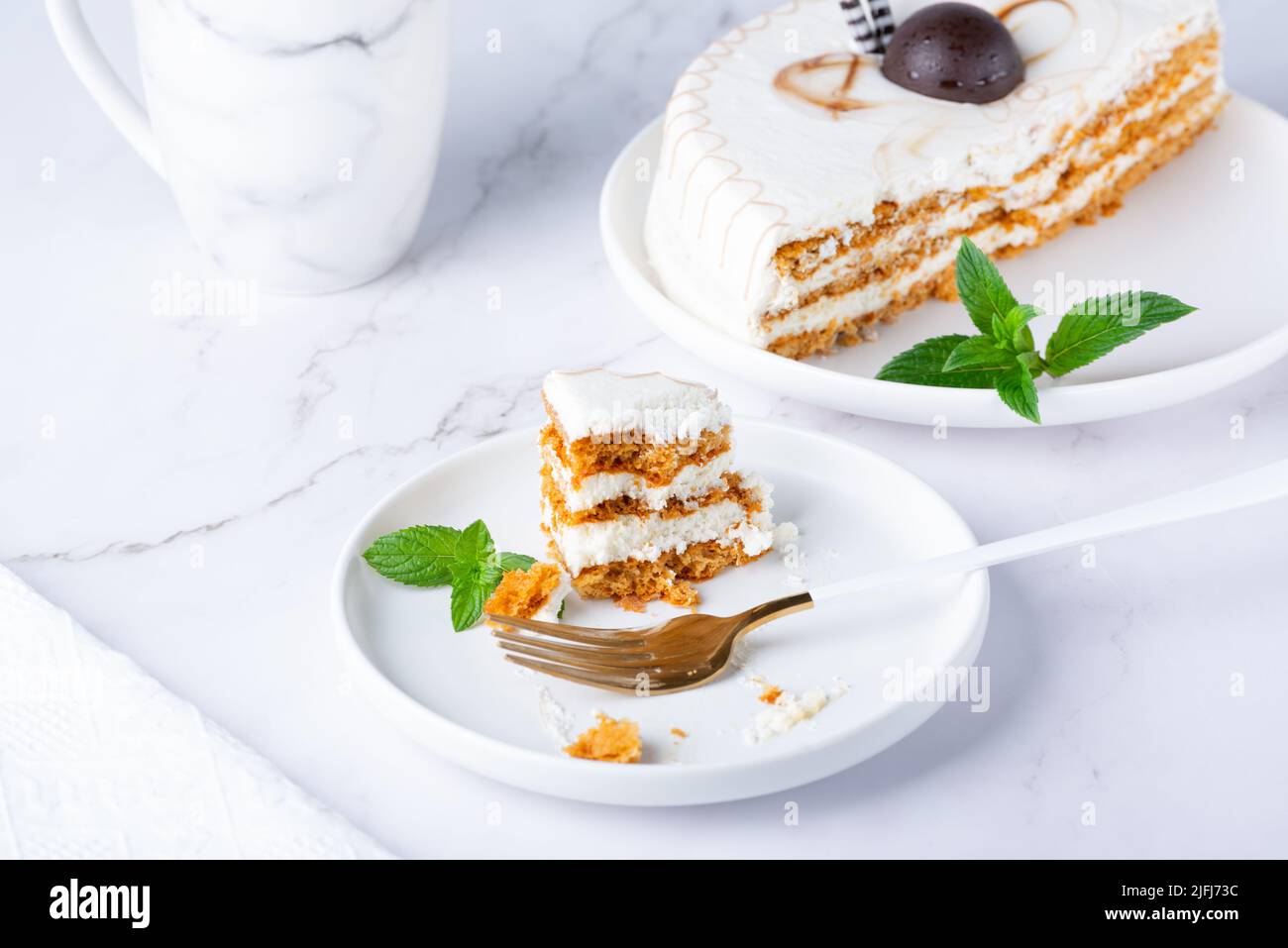 Eating cheesecake. Taking bite of cheesecake with fork Stock Photo - Alamy