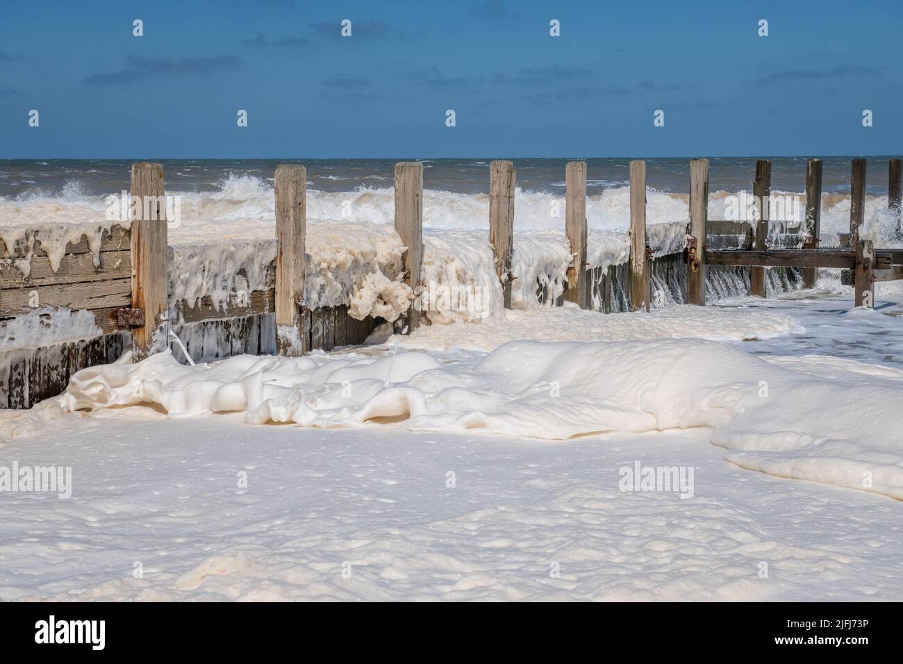 Sea foam, ocean foam, beach foam, or spume is a type of foam created by ...