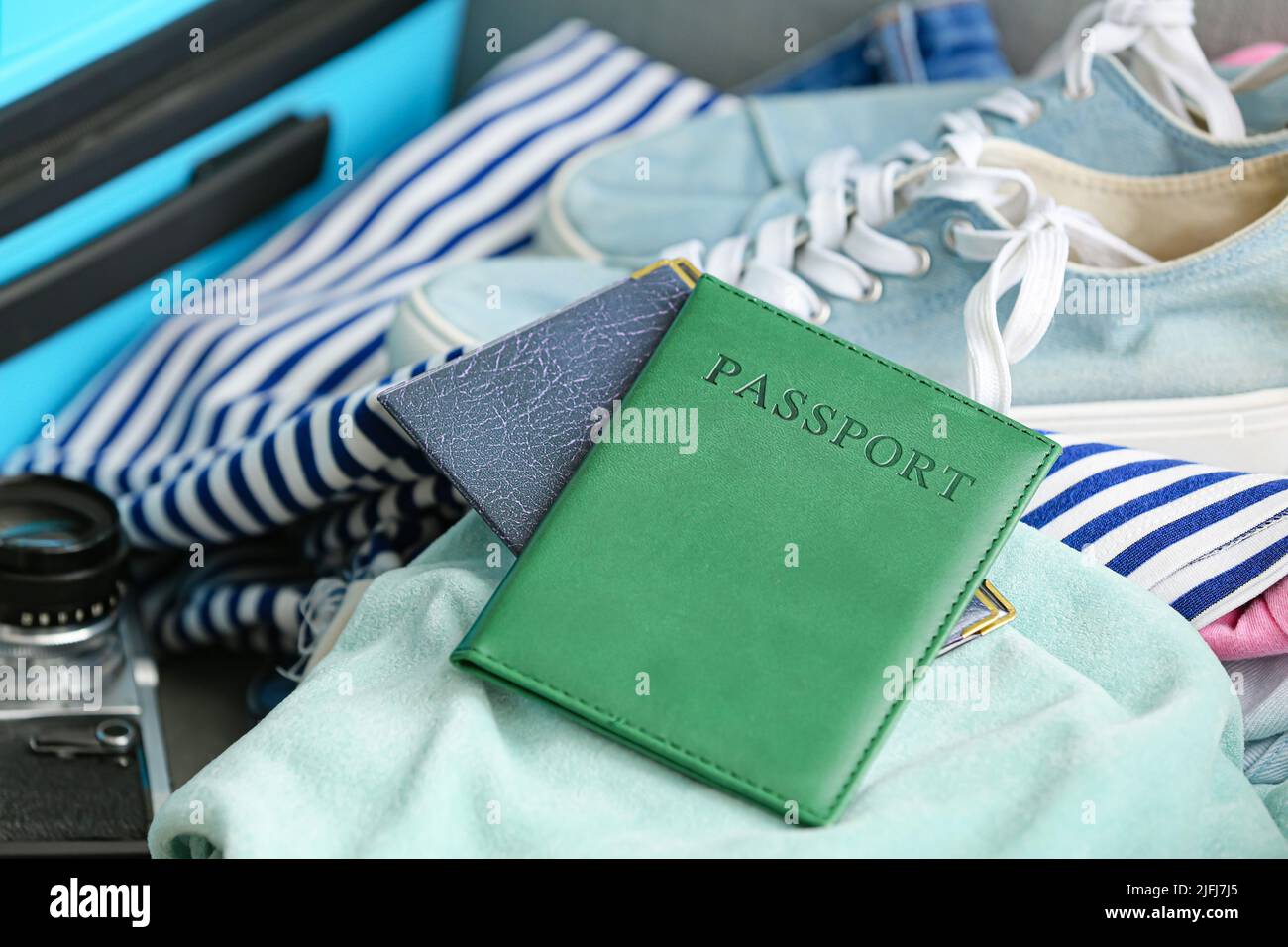 Passports on female clothes, closeup Stock Photo - Alamy