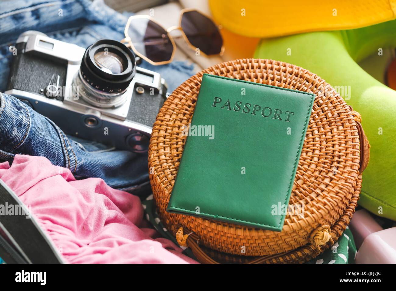 Passport in suitcase with accessories for travelling, closeup Stock ...