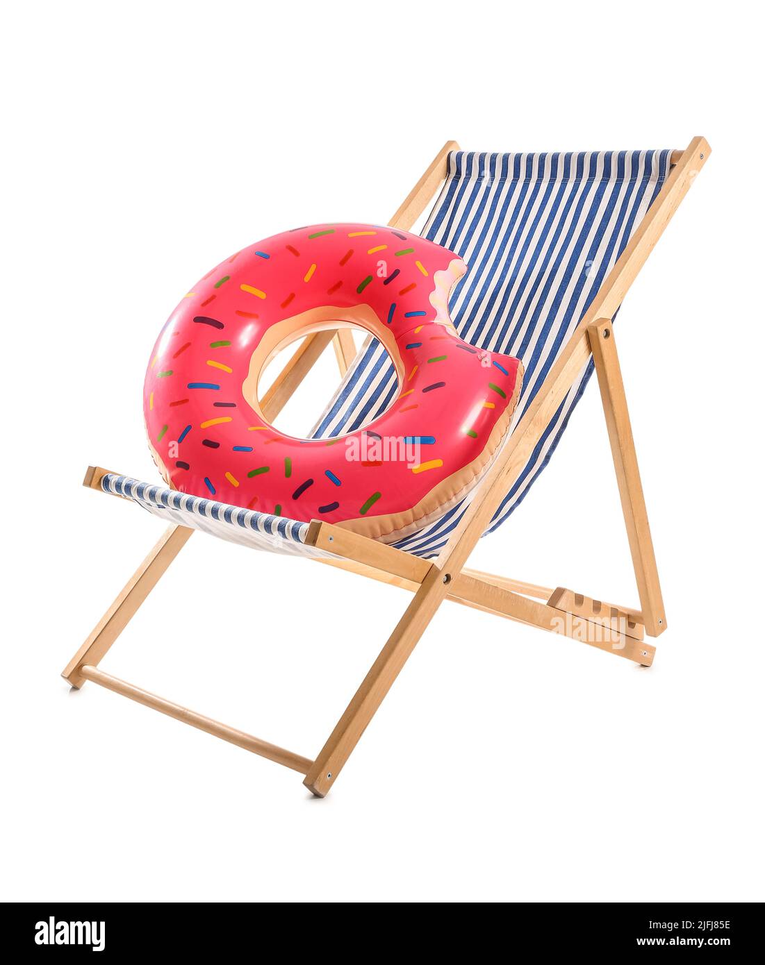 Striped deck chair with inflatable ring on white background Stock Photo ...