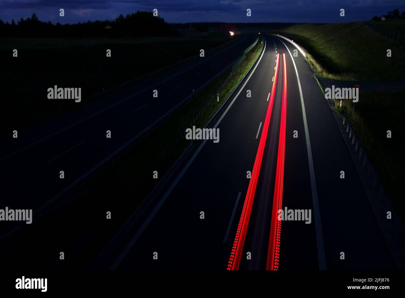 Night traffic on a motorway. Speed, colours, perspective Stock Photo ...