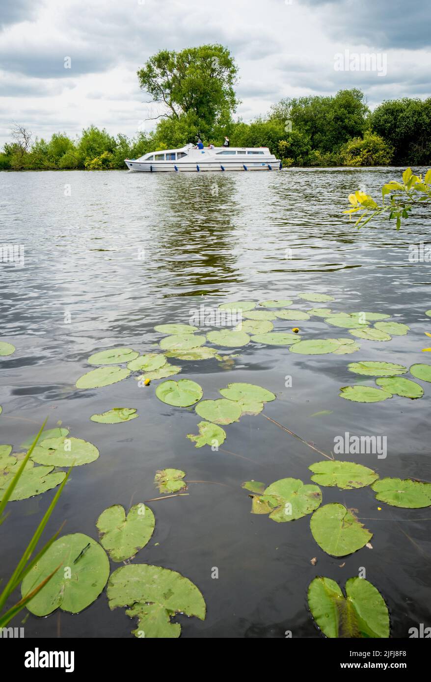 Sailing boats and river cruisers on the Norfolk Broads Stock Photo - Alamy