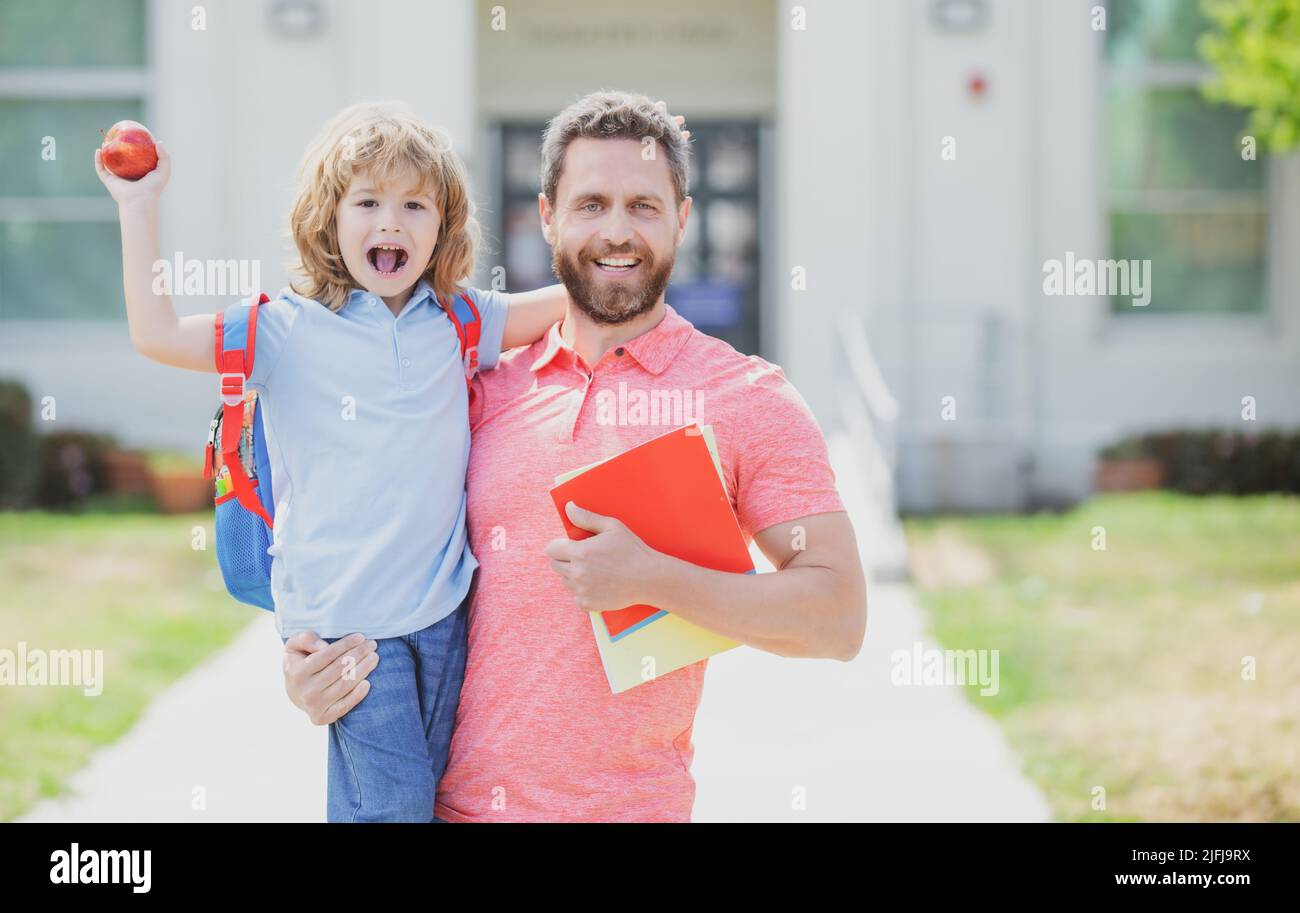 Portrait of happy father and son come back from school Stock Photo - Alamy