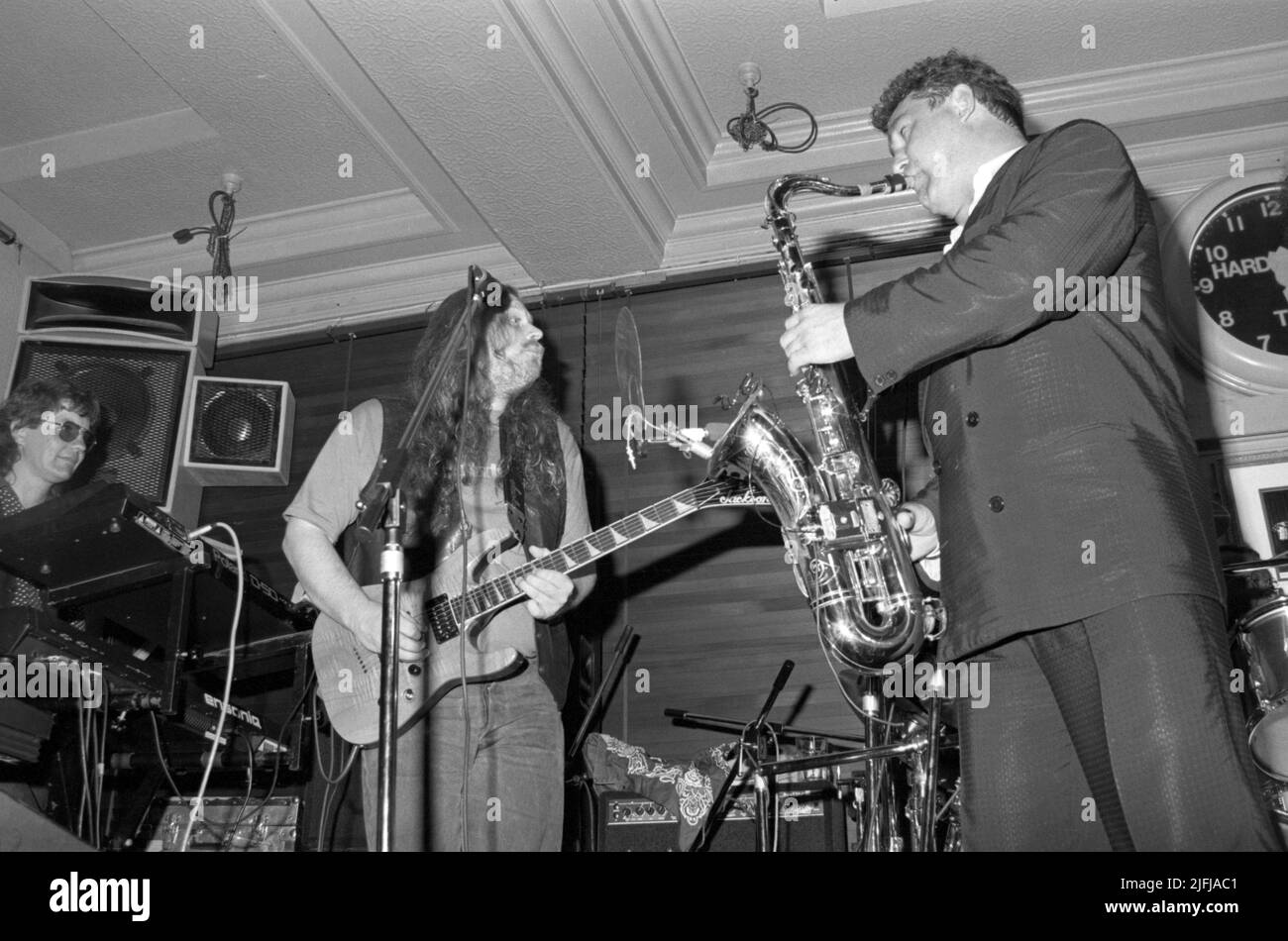 Guitarist Warren Haynes and saxophonist Raf Ravenscroft performing at ...