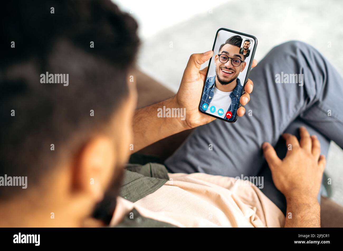 Two guys talking hi-res stock photography and images - Alamy