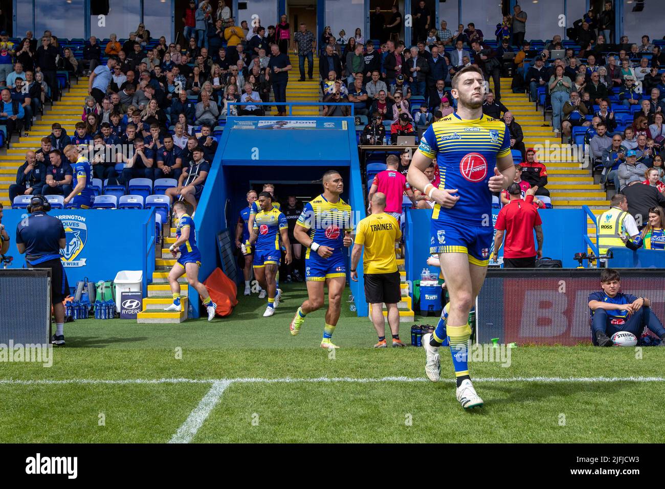 Jake Wardle #34 of Warrington Wolves coming out of the tunnel ahead of ...
