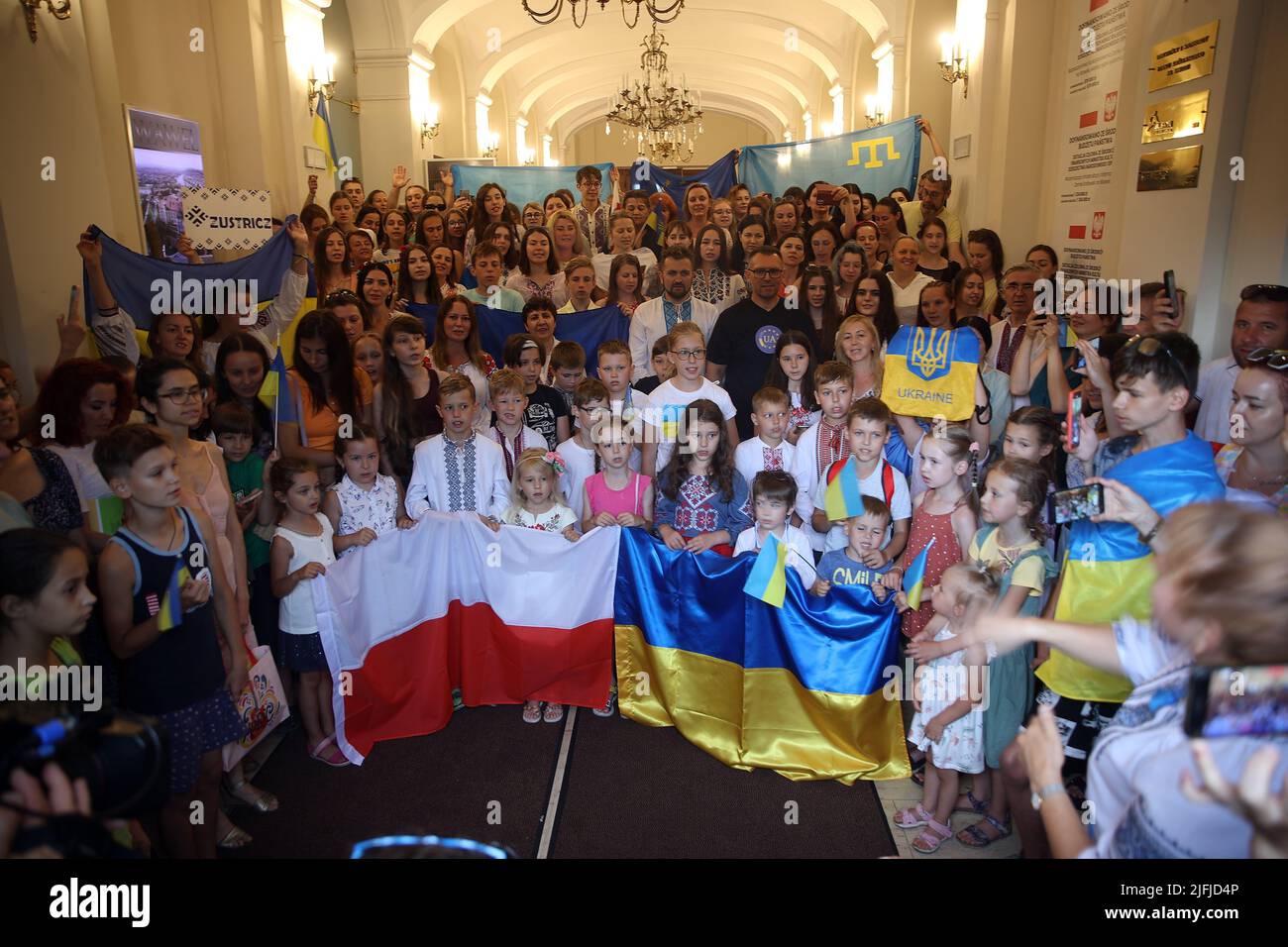 Cracow, Poland. 28th June, 2022. People holding Polish and Ukraine ...