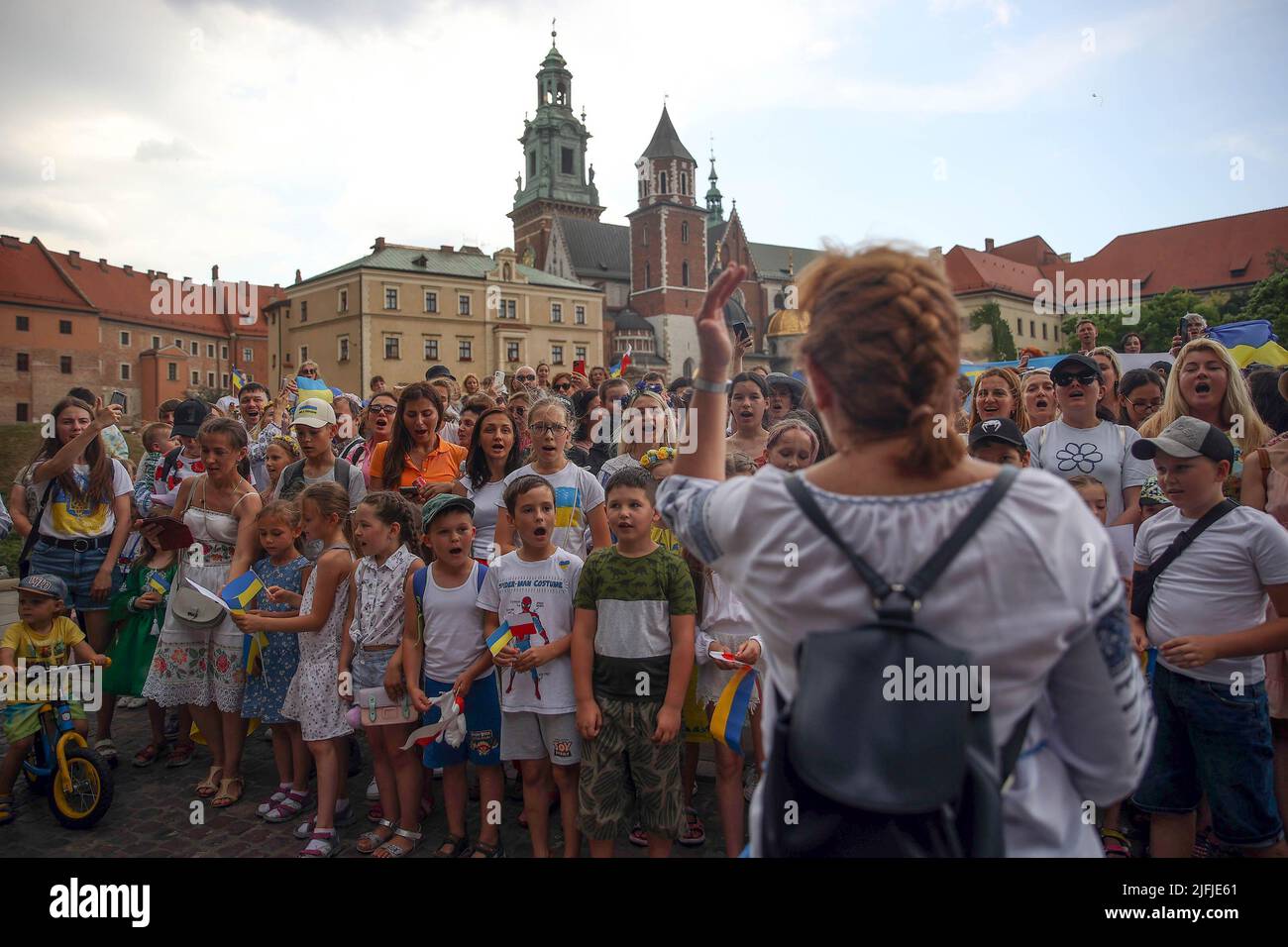 Cracow, Poland. 28th June, 2022. People seen singing during the record ...