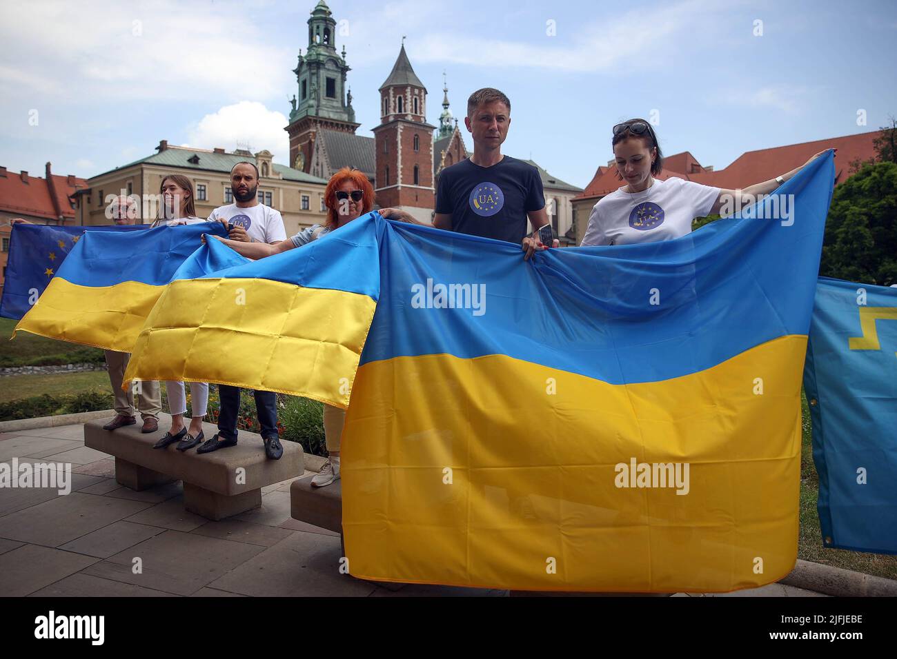 People holding Ukrainian flags during the record breaking attempt ...