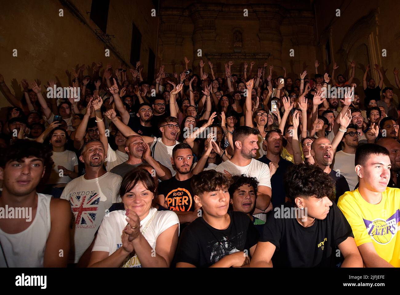 Citizens await the passage of the procession. The celebrations of the ...