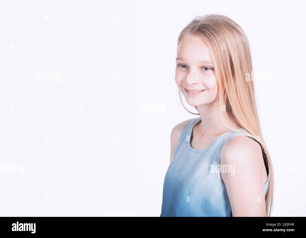Charming happy young girl introducing herself to new classmates ...