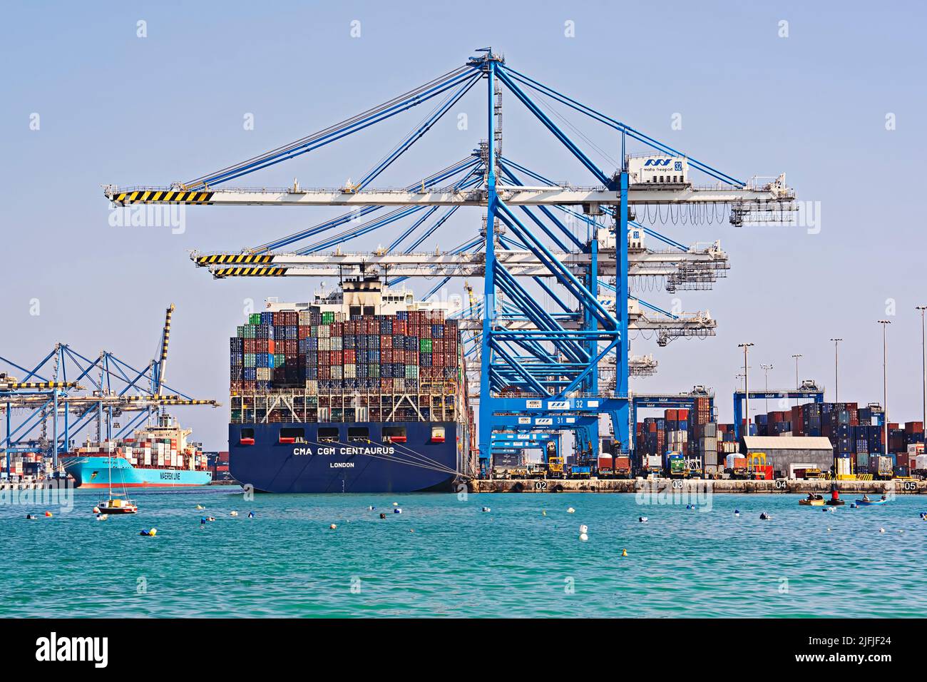 Port activities, big container ship discharging and loading in freeport ...