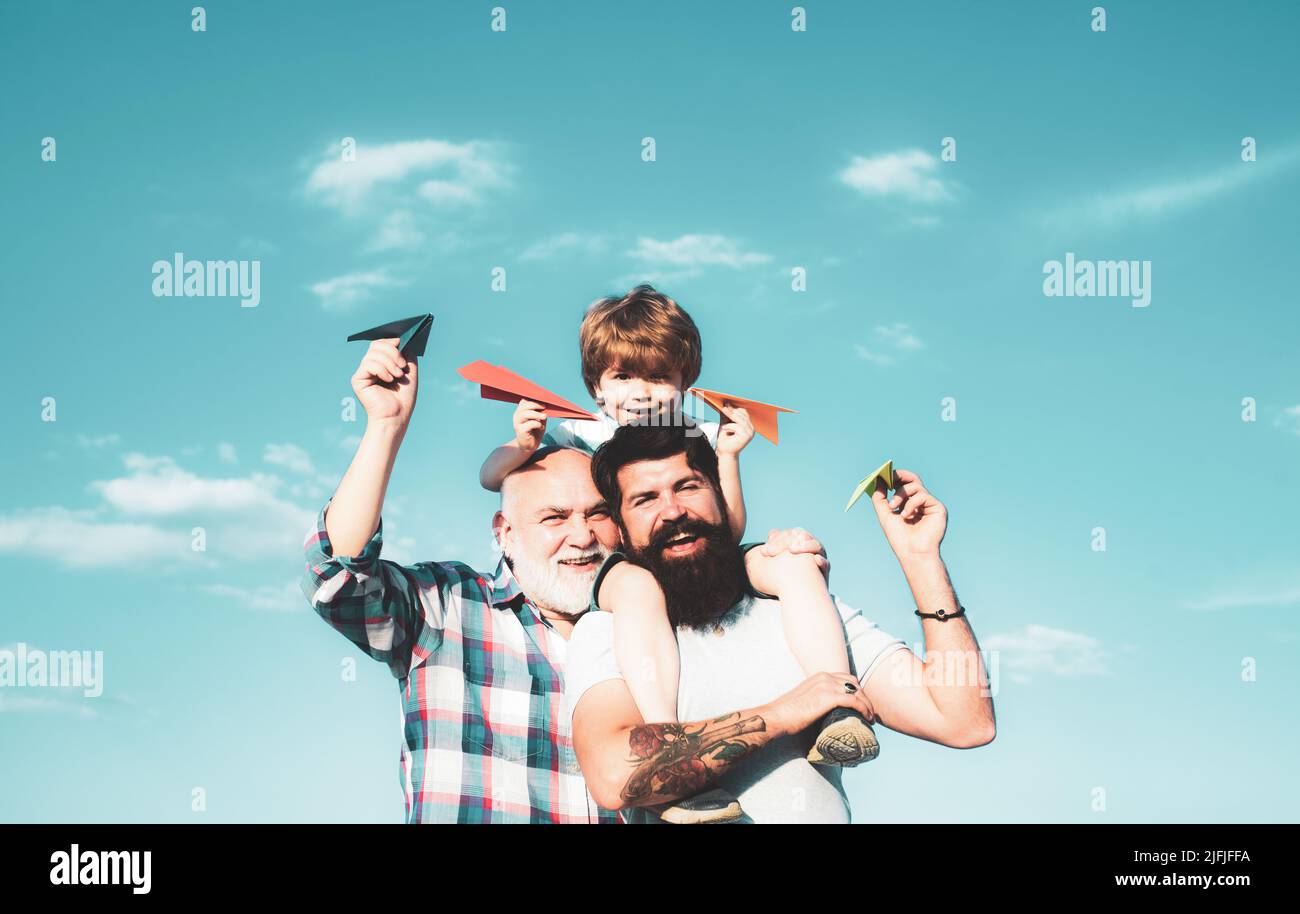 Kid pilot with toy jetpack against sky background. Happy three ...