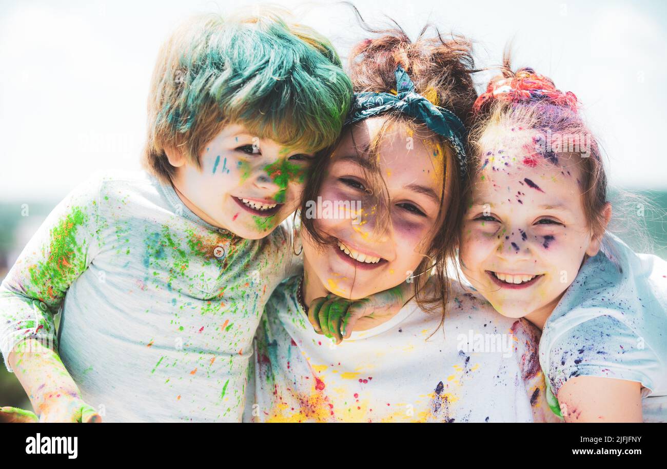 Kids celebrate holi with color, happy holi. Portrait of a happy ...