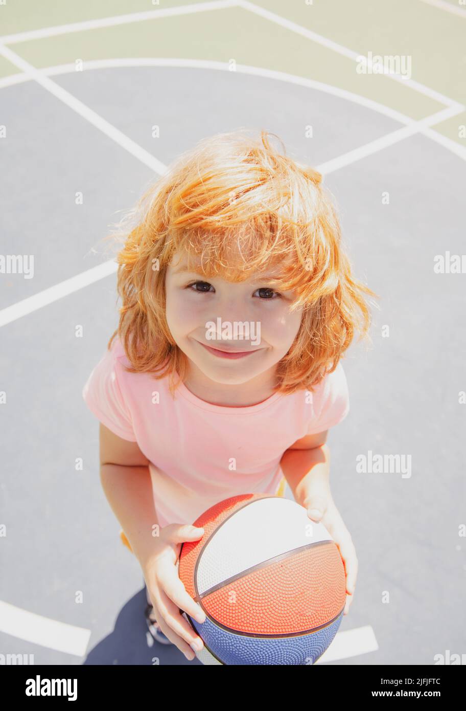 Kids play basketball portrait, head of cute child Stock Photo - Alamy