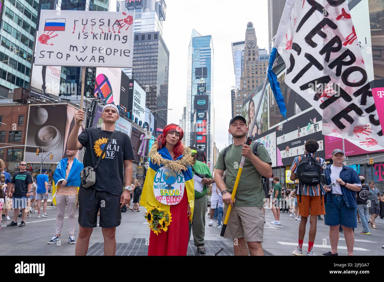 NEW YORK, NEW YORK - JULY 02: People hold flags and signs at a protest ...