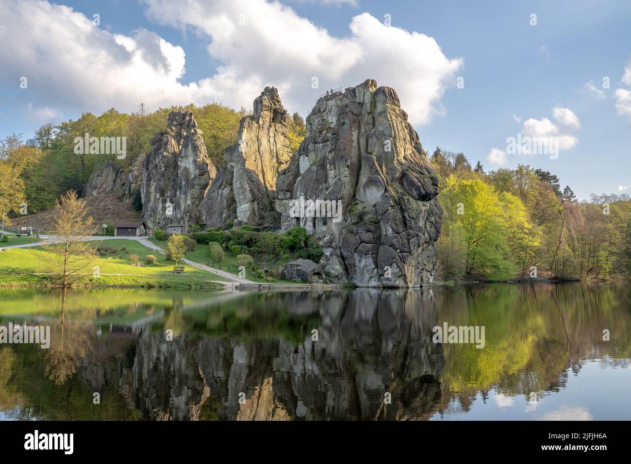 A Beautiful shot of Extern Stones reflecting on a lake water Stock ...