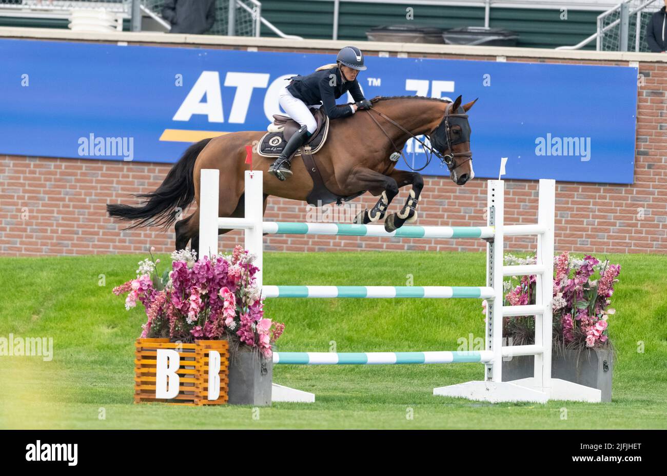 Calgary, Alberta, Canada, 2022-07-03,Katie Laurie (AUS) riding Django ...