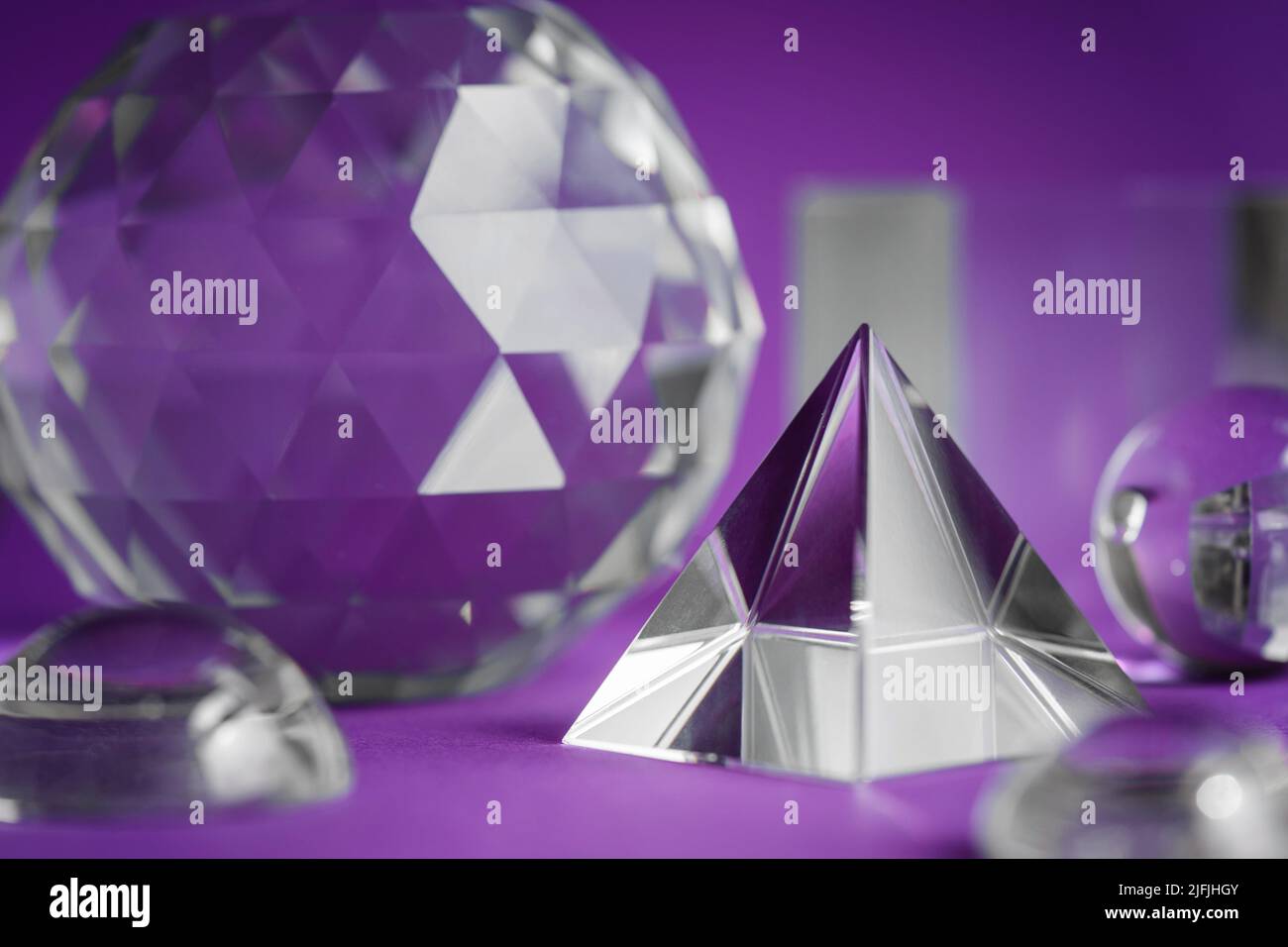 Crystal prism refracting light, magic crystals and pyramid, sphere and ...