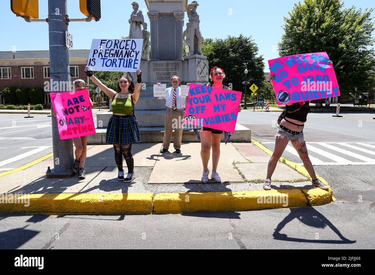Bloomsburg, United States. 03rd July, 2022. People hold placards during ...