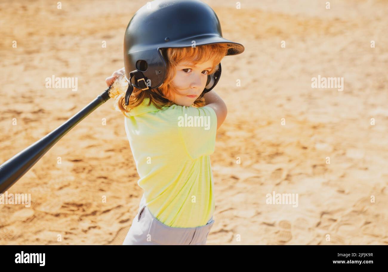Kid holding a baseball bat. Pitcher child about to throw in youth ...