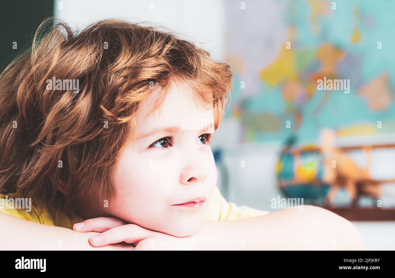 Kid gets ready for school. Elementary school classroom. Home school for ...