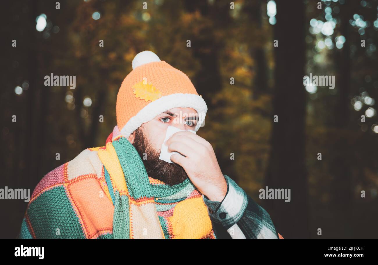 Bearded man sneezing and coughing. Sick guy catch cold. Sick boy at ...