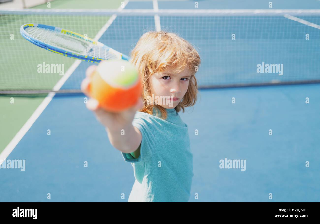 Kid boy at the tennis competition. Child practicing tennis forehand ...