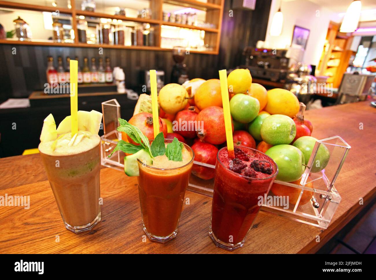 Smoothies and fruits on the restaurant table Stock Photo - Alamy