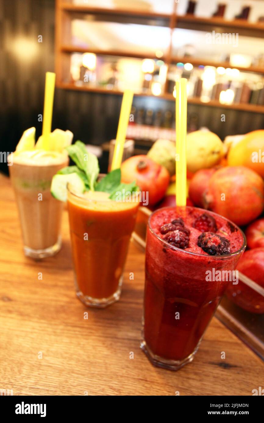 Smoothies and fruits on the restaurant table Stock Photo - Alamy