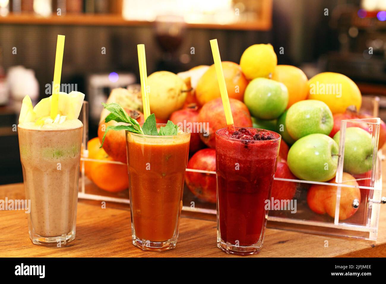 Smoothies and fruits on the restaurant table Stock Photo - Alamy