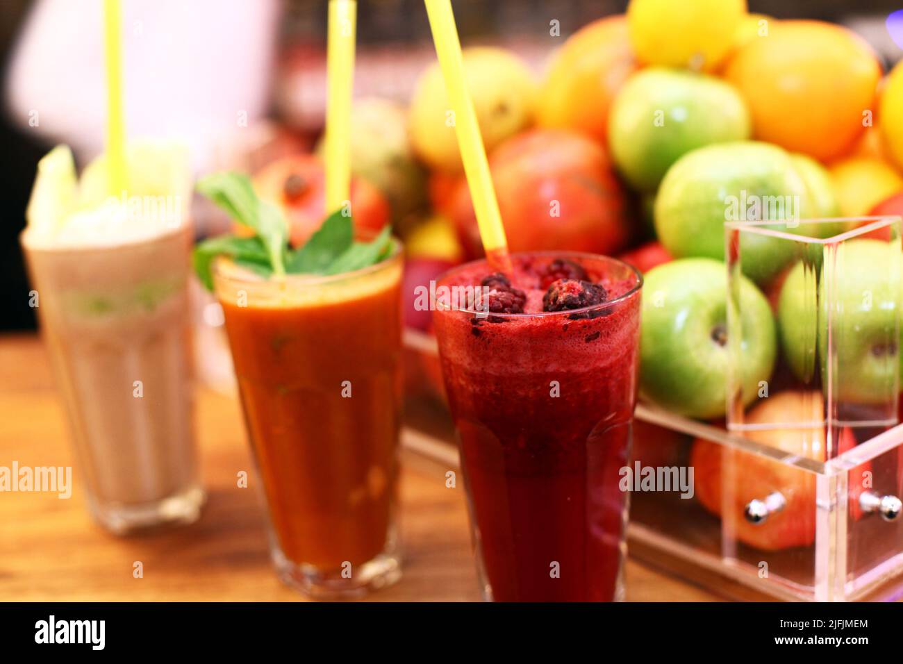 Smoothies and fruits on the restaurant table Stock Photo - Alamy